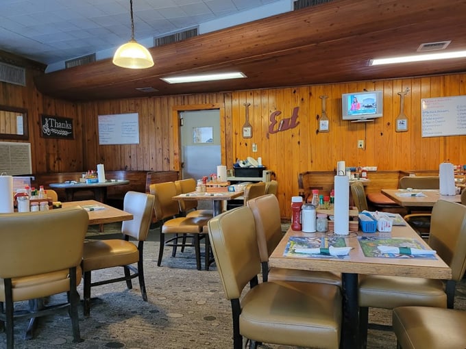 Wood-paneled walls and comfortable seating create that unmistakable "been here forever" vibe that no corporate designer could ever authentically replicate.