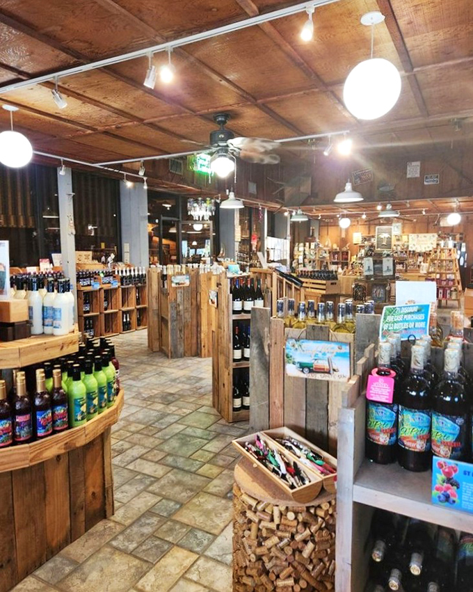 Interior view: Rustic wooden displays house a rainbow of fruit wines under warm lighting, creating an atmosphere that's both inviting and authentically Floridian.