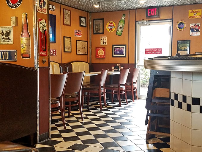 Step inside and the 1950s never left &ndash; checkered floors, burgundy booths, and walls plastered with enough nostalgic memorabilia to make your grandparents feel young again.