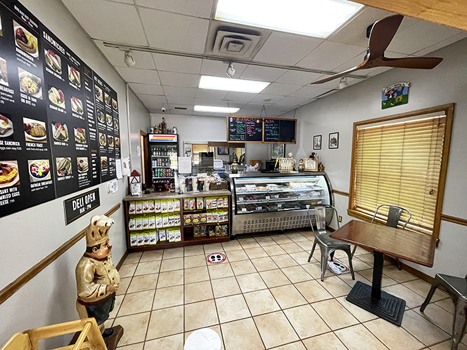 Inside, a cheerful chef statue stands guard while the aroma of fresh-baked bread fills the air, making it nearly impossible to leave empty-handed.