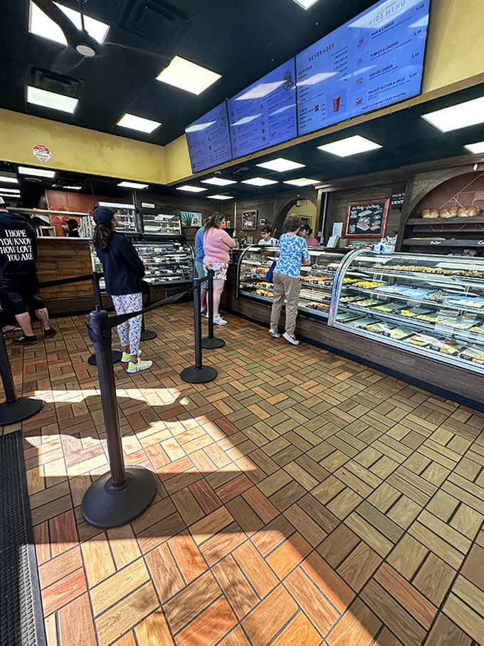 Inside La Segunda, customers line up at glass display cases filled with tempting pastries and bread, a scene unchanged for generations.