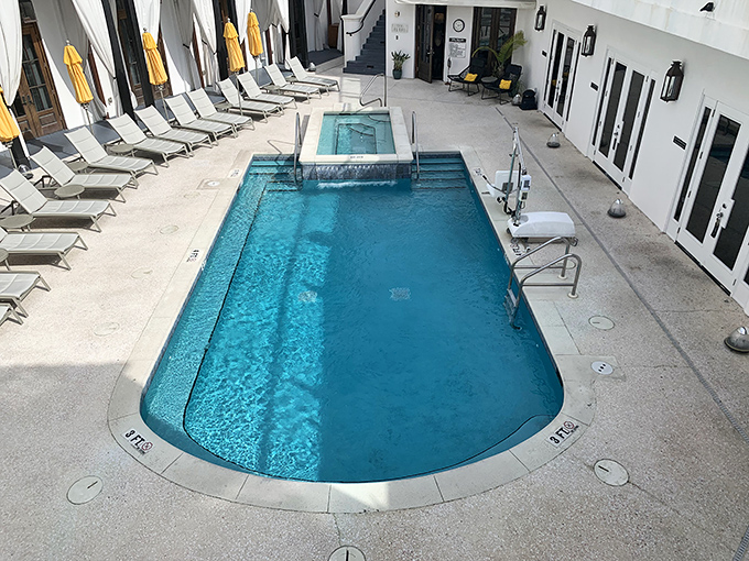 Dive into serenity at The Pearl's pool area, where relaxation isn't just suggested&mdash;it's practically mandatory.