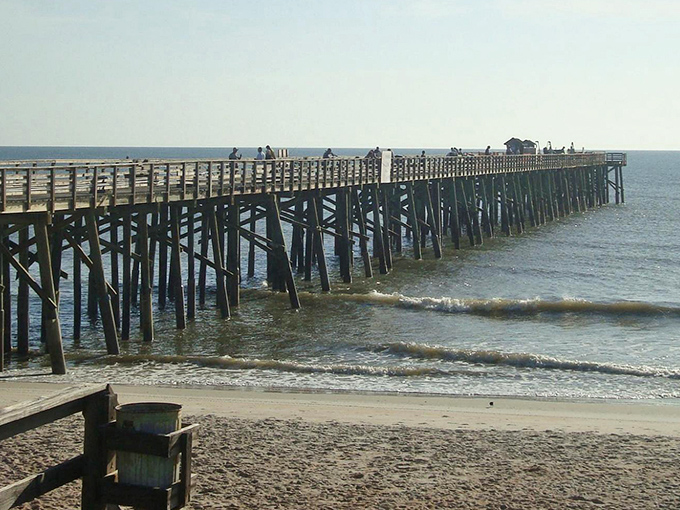 The iconic wooden pier extends into the Atlantic, offering prime real estate for fishing enthusiasts and sunset photographers alike.
