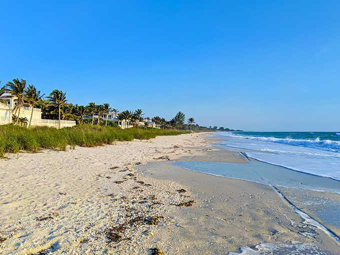 Boca Grande's untouched shoreline offers a peaceful retreat where the emerald waters gently kiss the pristine white sand, far from the tourist crowds.