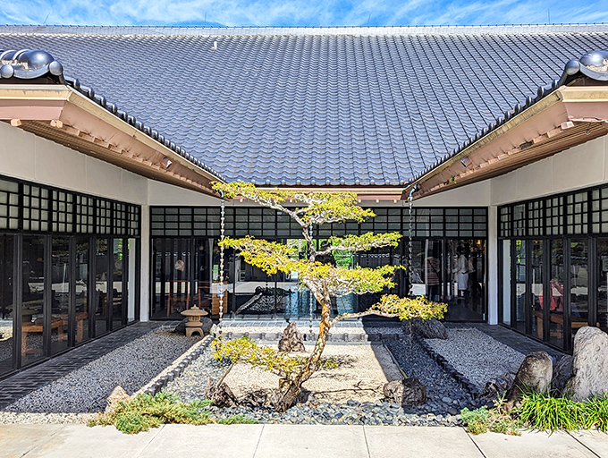 The meticulously designed Japanese garden creates a serene escape, with every rock and plant placed to achieve perfect harmony with nature.