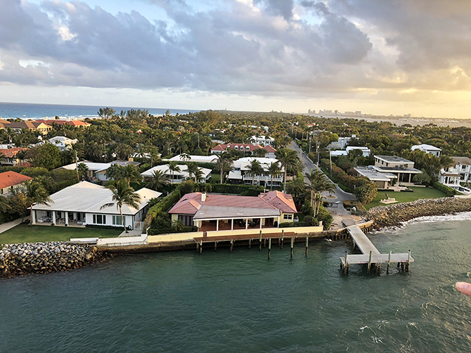 The pristine marina at Palm Beach offers a glimpse into the island's upscale lifestyle, with waterfront properties and palm-lined promenades.