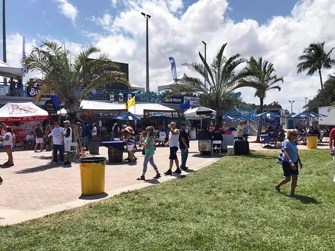 Waterfront festival vibes bring together food lovers under sunny skies for a celebration of ocean-fresh flavors and good times.