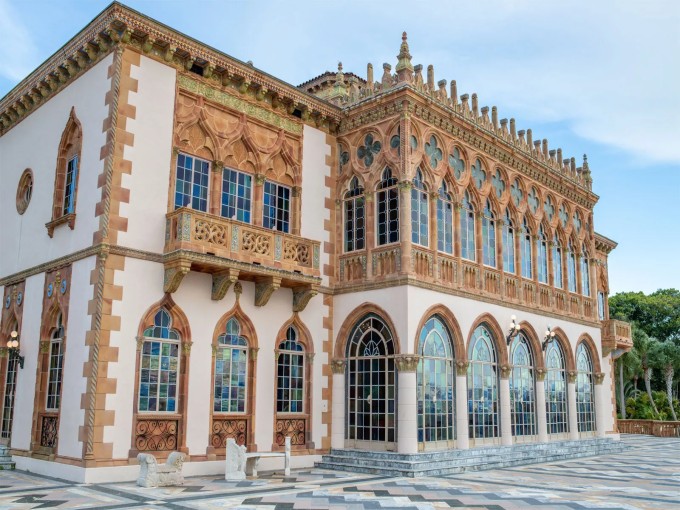 Elaborate stonework and colorful patterns adorn the Ringling Museum's courtyard, creating an authentic European art experience in Sarasota.