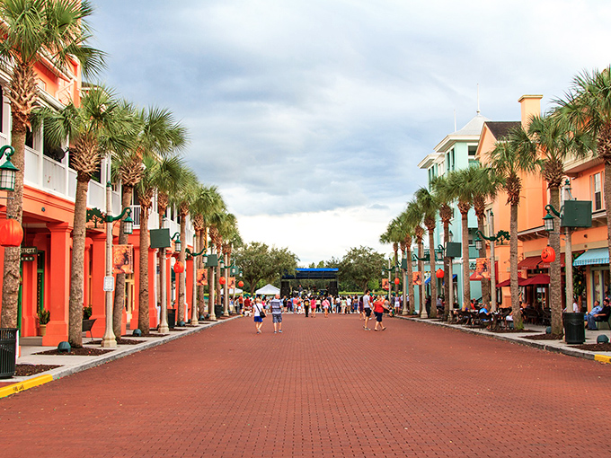 Palm trees stand sentinel along Celebration's brick-paved streets, where every building looks like it passed a very strict charm inspection.