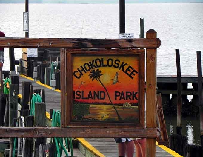 This hand-painted sign welcomes you to Chokoloskee Island Park with the kind of charm that GPS directions simply cannot provide.