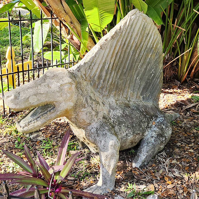This dimetrodon seems to be saying, "Yes, I know I'm technically not a dinosaur, I'm a synapsid from the Permian period." Science lessons come in concrete packages at Bongoland.