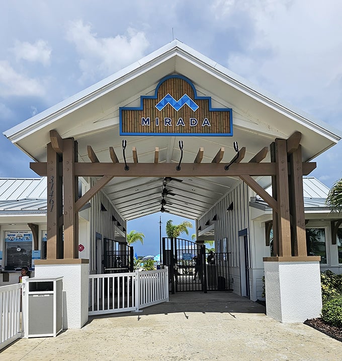 The Mirada gateway beckons water enthusiasts through its wooden beams and crisp white siding – first-time visitors often pause here in disbelief.