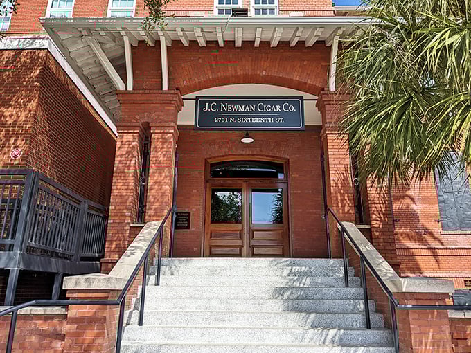 "J.C. Newman Cigar Co." announces itself with understated elegance. These doors lead to a world where craftsmanship never went out of style.