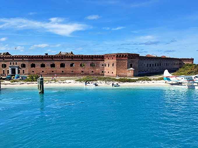 The massive fortress appears to float on turquoise waters, its moat creating a natural swimming pool that's perfect for cooling off.