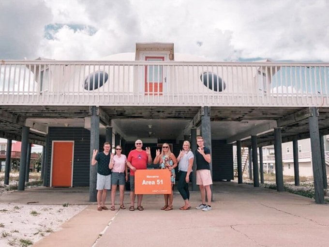 Nothing says "best vacation ever" quite like gathering your crew in front of your very own UFO for the ultimate group photo.
