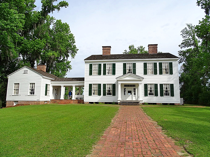 The Gregory House stands proudly atop the bluff, a Southern belle who's seen more history than your high school textbook.