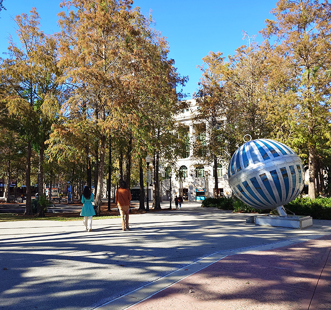 Heritage Square provides the perfect backdrop for this aquatic-themed masterpiece, where history meets contemporary art in a harmonious urban setting.