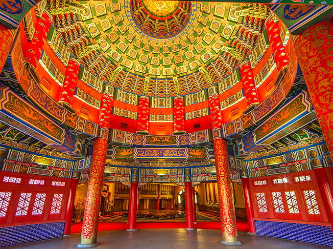 Look up! The ceiling's intricate patterns tell stories in color and geometry that would make your high school math teacher weep with joy.