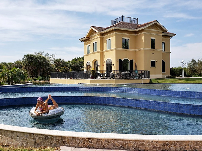 Mediterranean elegance meets Florida sunshine at the main building, where reflections double the visual feast for garden visitors.