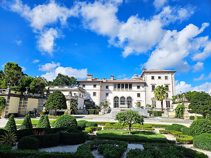Not your average beach house! This Mediterranean Revival mansion makes your neighbor's renovation look like a kindergarten art project.