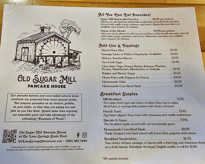 The menu tempts with all-you-can-eat pancake options and hearty breakfast staples, promising a feast for hungry park visitors.