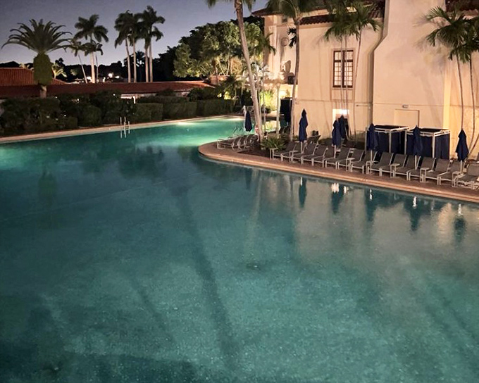 Night swimming takes on new meaning at the Biltmore's illuminated pool, where even the palm trees seem to be showing off for the evening crowd.