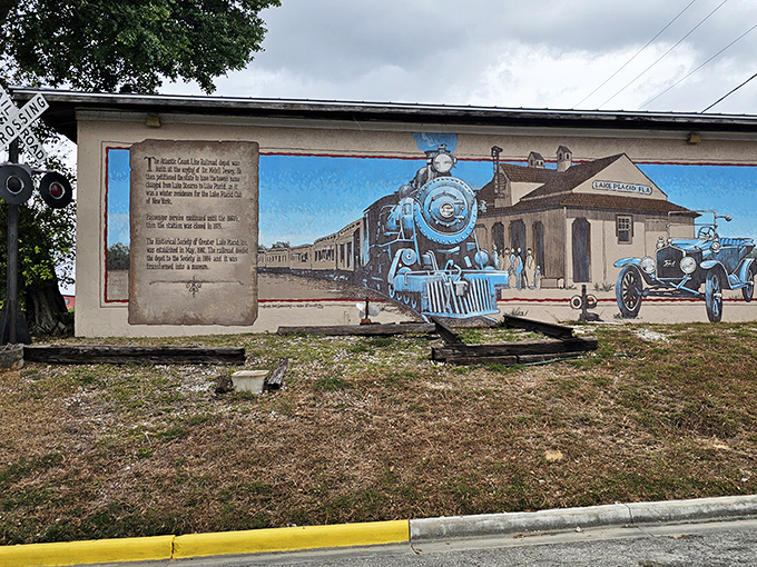 History rolls into town on this nostalgic train station mural, complete with vintage automobiles and period-perfect details.