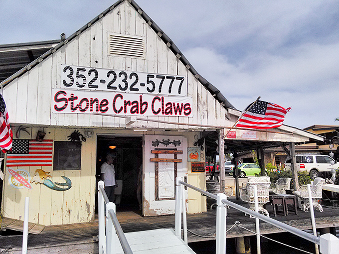 Stone Crab Claws &ndash; where weathered wood, American flags, and the day's freshest catch create Florida's most authentic seafood experience.