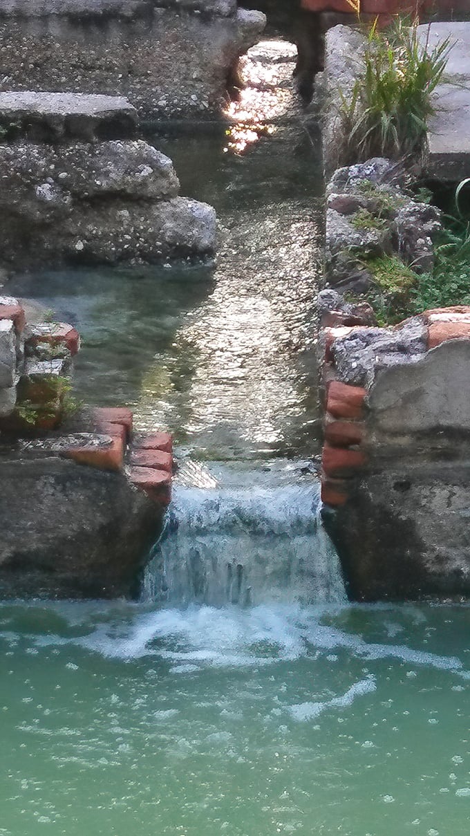 Sunlight dances on mineral-rich waters that once promised miraculous cures to wealthy visitors seeking relief from modern ailments.