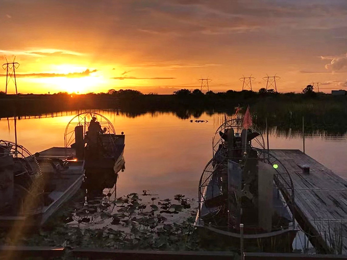 Mother Nature's light show outperforms any man-made spectacle as the sun bids farewell over Sawgrass Recreation Park's watery domain.