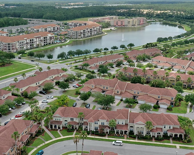 Venetian Bay's waterfront living showcases Florida's indoor-outdoor lifestyle, with homes embracing the lakeside views and tropical landscaping.