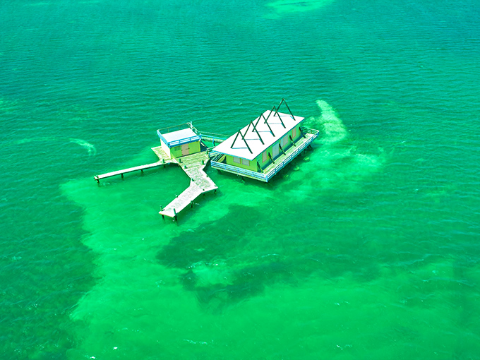 From above, Stiltsville looks like a game of architectural Monopoly played by mermaids &ndash; tiny structures scattered across a board of brilliant blue.
