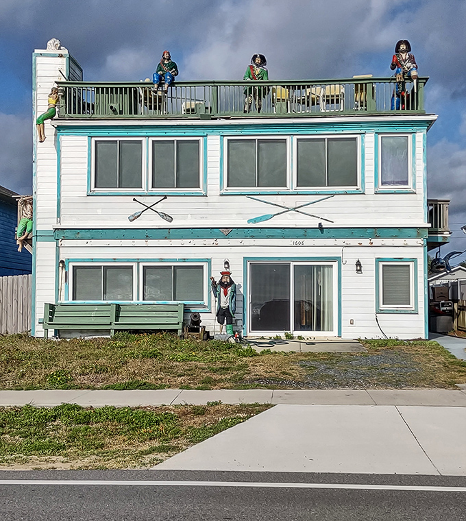 Colorful beach houses dot the shoreline, complete with whimsical decorations that tell stories of coastal living and salty adventures.
