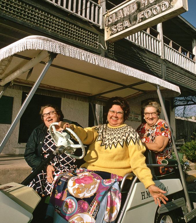 These smiling ladies in their golf cart represent the heart and soul of Cedar Key &ndash; where hospitality comes with a side of sunshine.