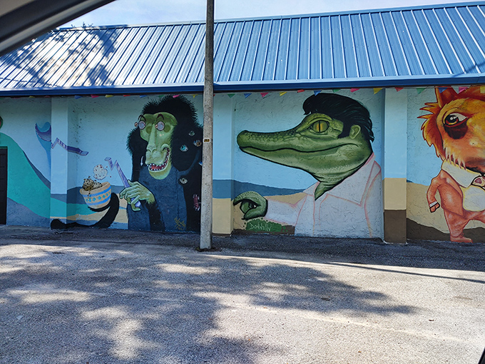 Where else can you find a monkey enjoying ice cream, an alligator in business attire, and a lion with attitude? Only on Boyett's exterior mural gallery.