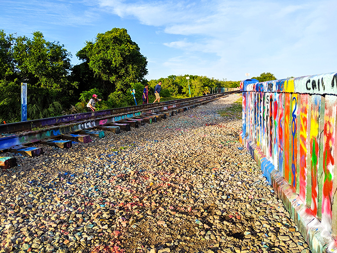 Every surface becomes a canvas here, with layers of messages creating a visual history you can almost read.