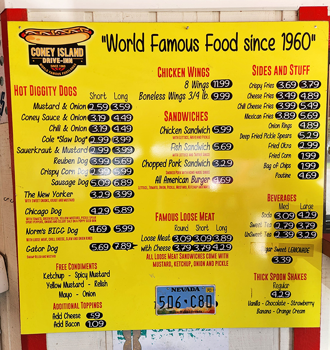 The menu board glows with promise &ndash; a roadmap to hot dog nirvana that's been guiding hungry travelers for generations.