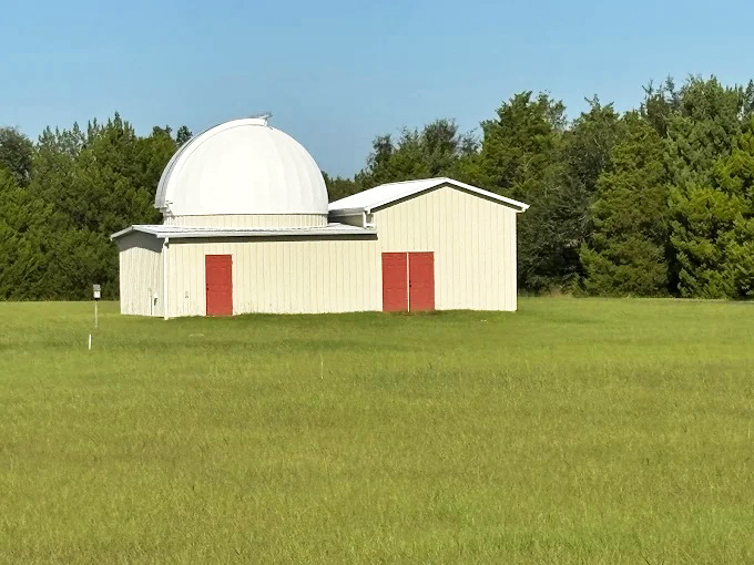 This unassuming structure by day transforms into a portal to the universe when darkness falls.