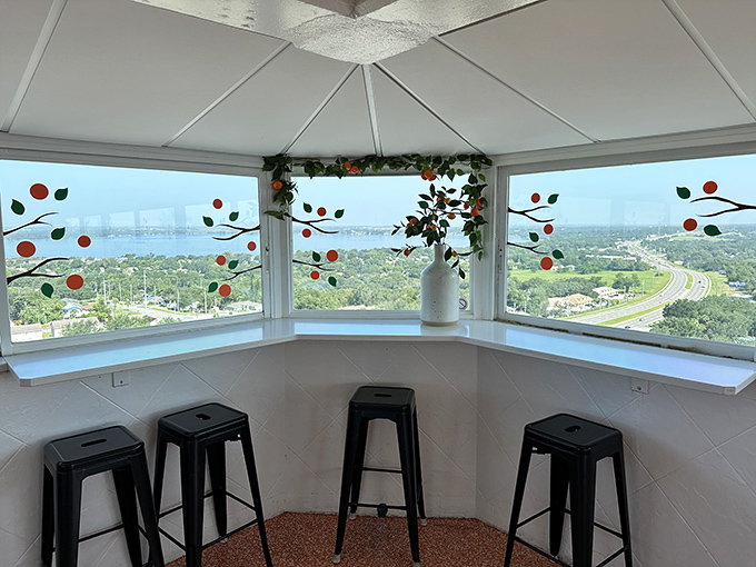 Orange-themed decor frames the spectacular panoramic views, a sweet reminder of the citrus heritage that gave this tower its purpose and name.