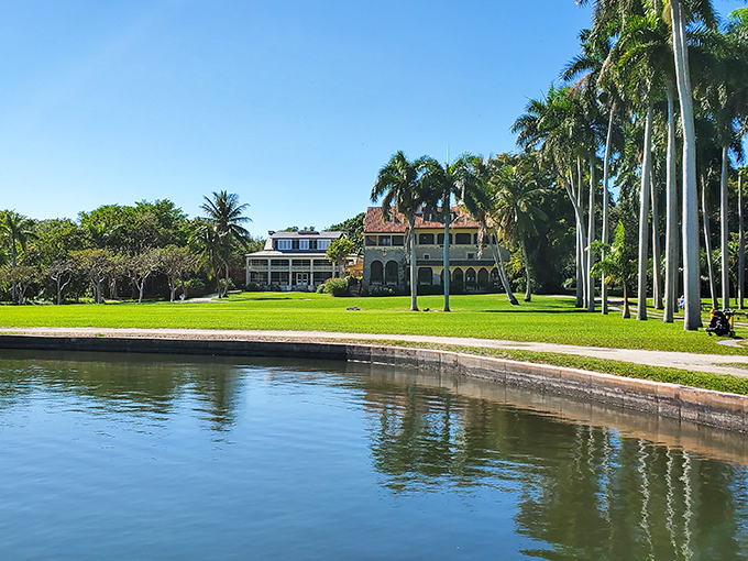 Where mansion meets mangrove &ndash; the estate's main house gazes serenely over grounds that transition from manicured lawns to wild Florida.