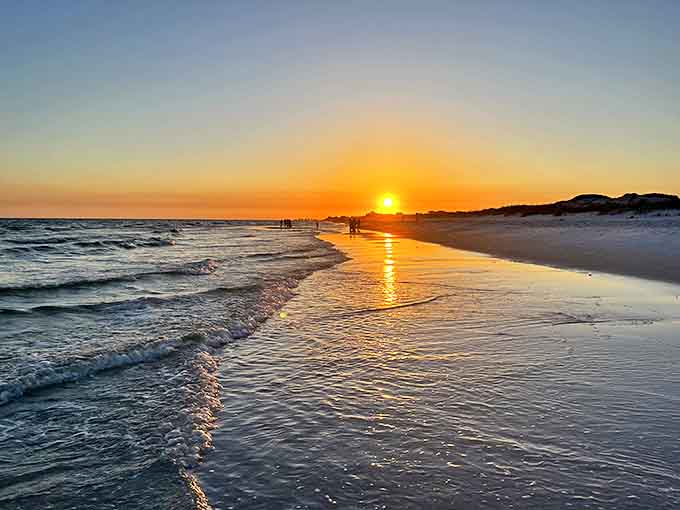 Mother Nature showing off at sunset, painting the sky in impossible colors that reflect off both Gulf waters and wet sand.