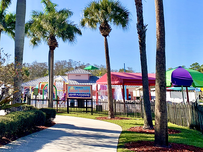 This multi-level water playground transforms ordinary kids into aquatic explorers, with that giant tipping bucket creating moments of delicious anticipation.