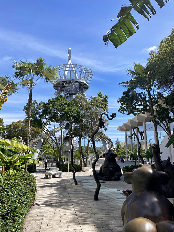 Palm trees frame the path to this architectural marvel, creating a quintessentially Floridian approach to an attraction that defies typical tourist expectations.