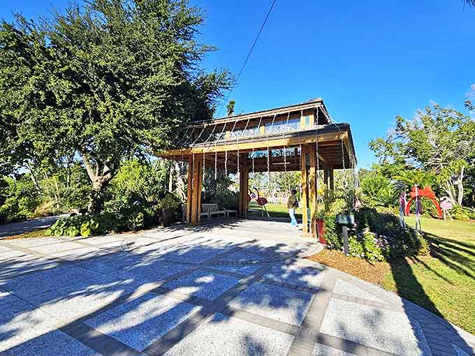 Explore the sunny pathways and unique garden structures at Selby Gardens, where nature and art blend seamlessly in the Florida sun.