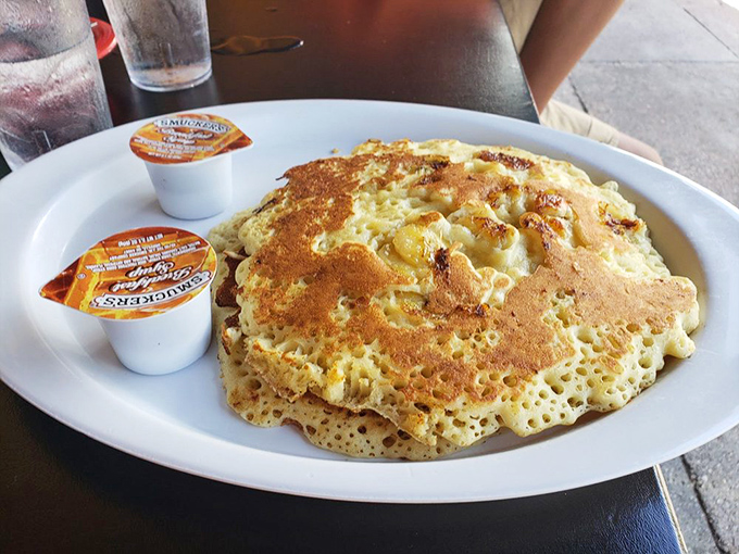 These banana pancakes aren't just breakfast, they're an event &ndash; golden discs of perfection with caramelized banana slices that would make Elvis himself swoon.