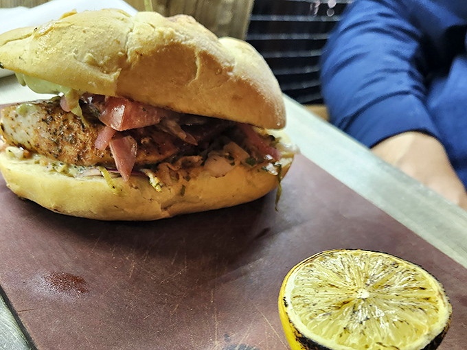 That blackened Mahi sandwich &ndash; perfectly spiced fish nestled in a pillowy bun with just the right amount of crunch and tang.