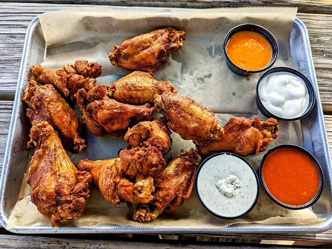 These aren't just wings &ndash; they're crispy, double-fried flavor bombs served with house-made sauces that'll make you reconsider your relationship with poultry.