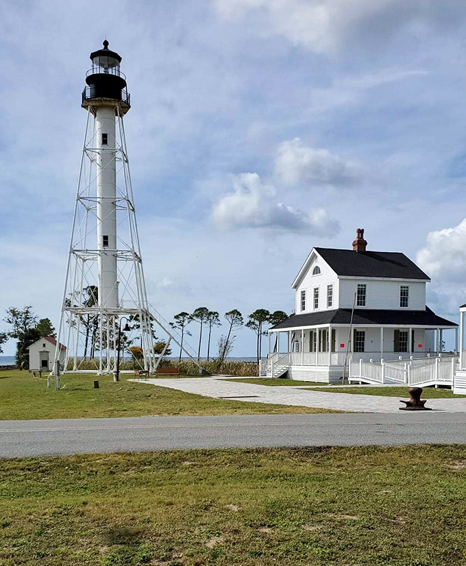 The historic Cape San Blas Lighthouse stands tall, a resilient sentinel that's been moved multiple times to escape the hungry Gulf.