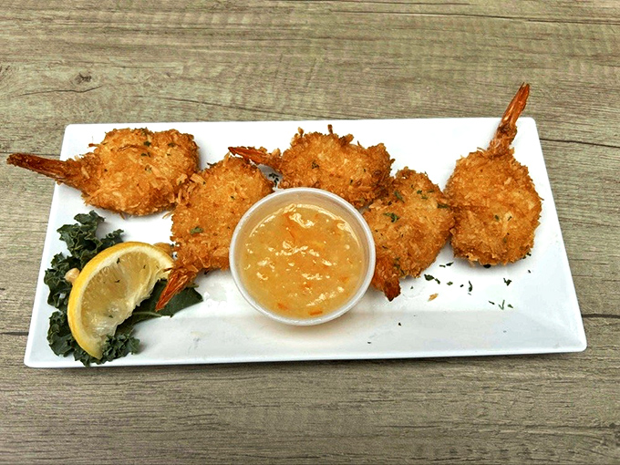 Golden perfection! These coconut shrimp aren't just fried &ndash; they're transformed into crunchy, sweet treasures that'll haunt your dreams.