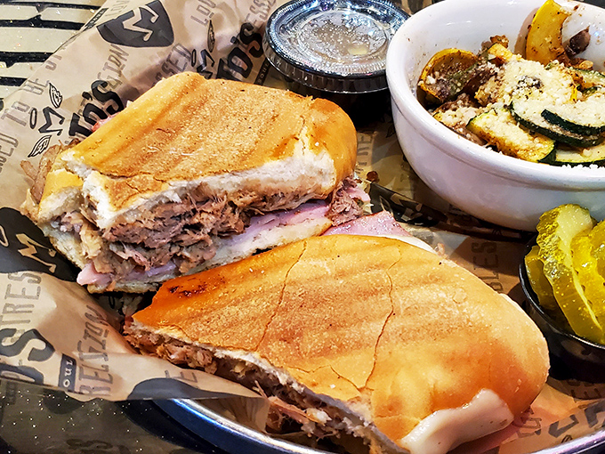 The star of the show! Mojo pork, ham, Swiss cheese, pickles, and mustard pressed between perfectly crispy Cuban bread. A sandwich symphony!